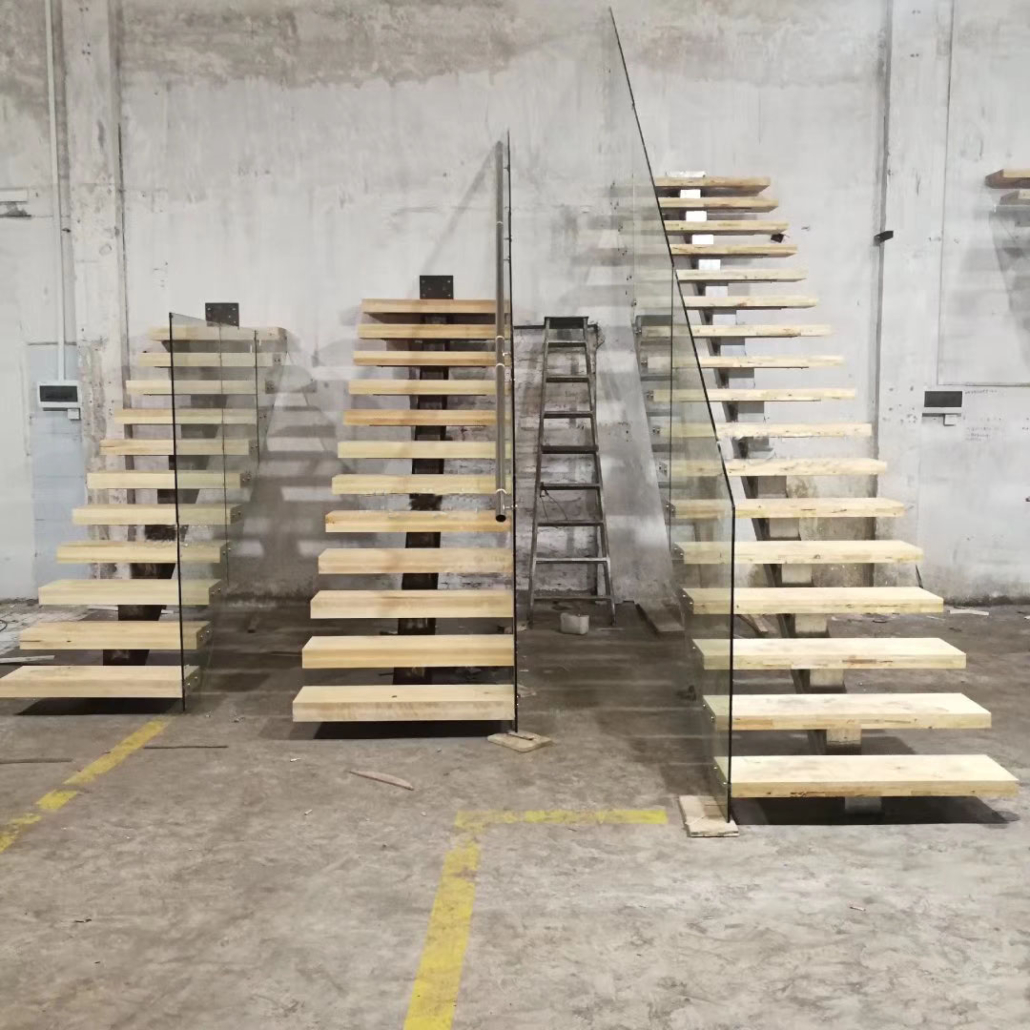 Mono stringer staircase with glass railing wooden treads